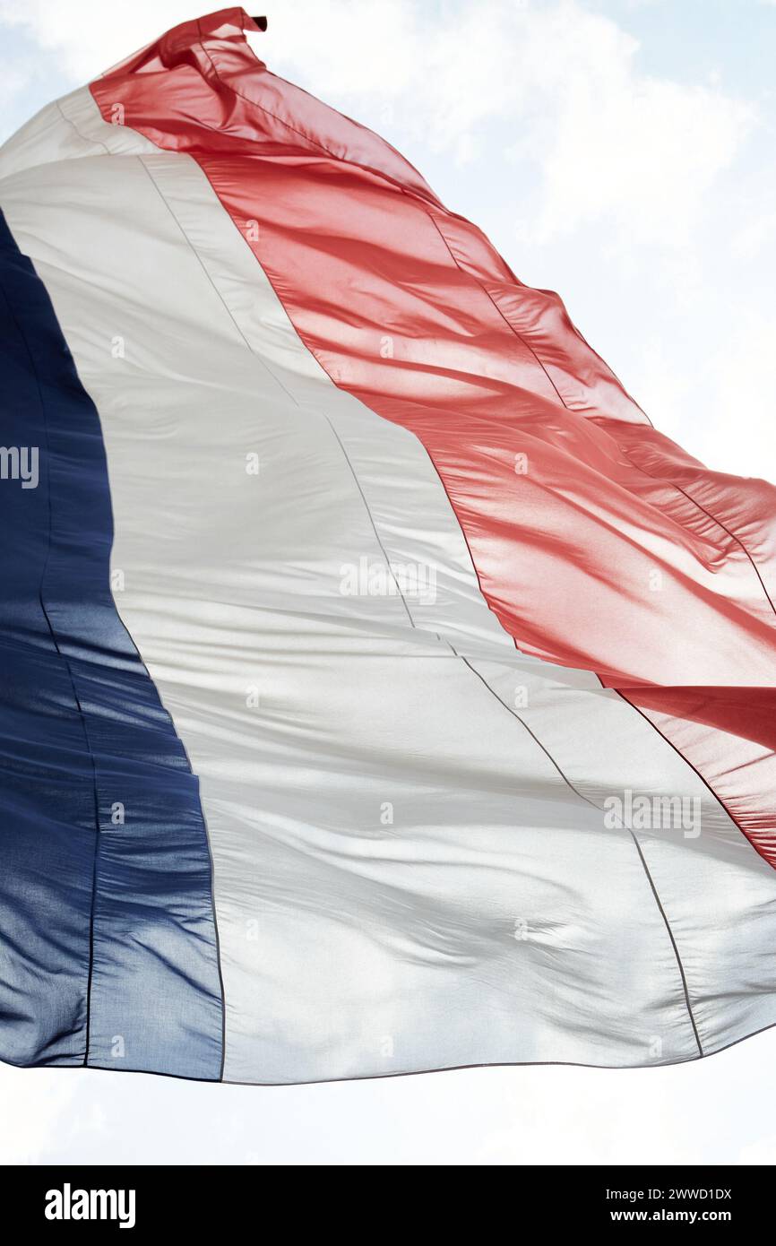 Vertical View of French Flag Flapping in Breeze Stock Photo - Alamy
