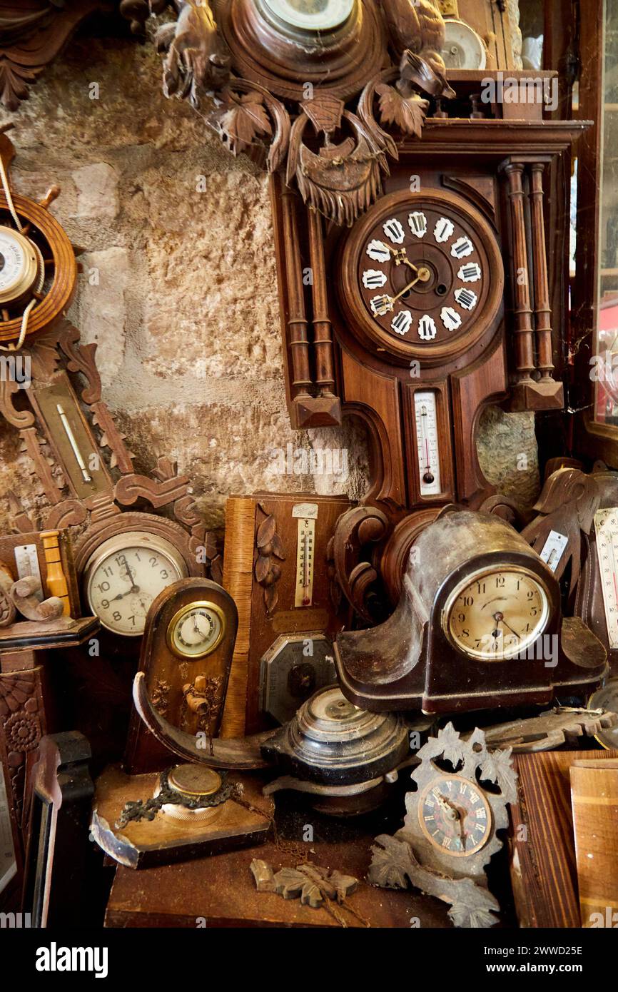 Old Clocks and Thermometers on a Stone Wall Stock Photo - Alamy