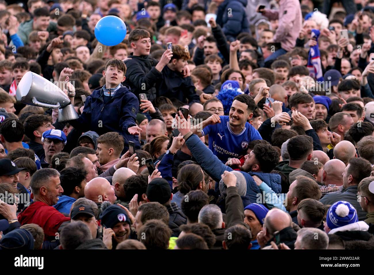 Chesterfield’s players celebrate their promotion with the fans on the ...