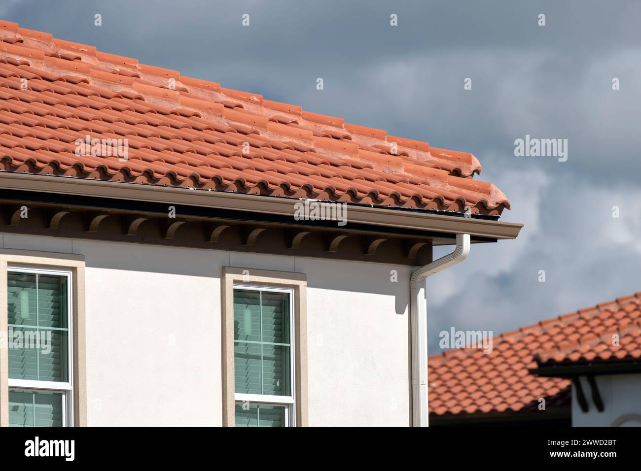 Tiled roof covering of condo building in Florida. Closeup of house ...