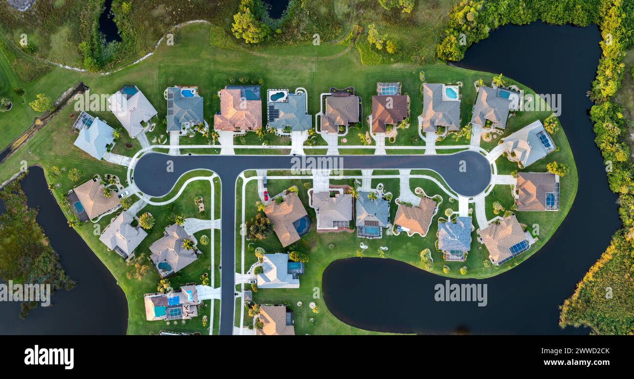 Aerial view of spacious family houses in Florida suburban area. Real ...
