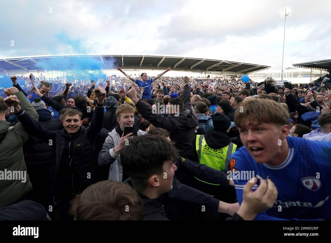 Chesterfield’s players celebrate their promotion with the fans on the ...