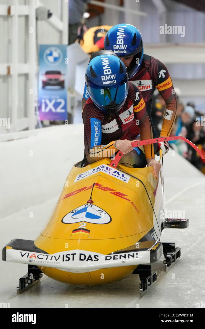 Kim Kalicki, bottom left, and Leonie Fiebig, behind, of Germany, start ...