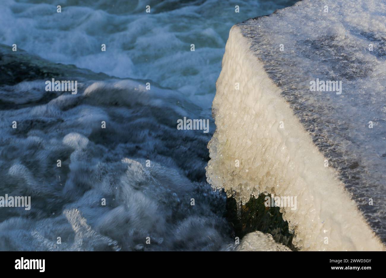 Water Cascading over Weir Step in river canal Stock Photo - Alamy