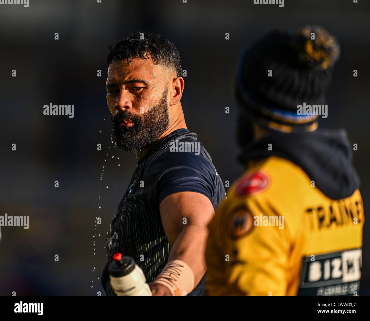 Zane Musgrove of Warrington Wolves takes a drink during pre match warm ...