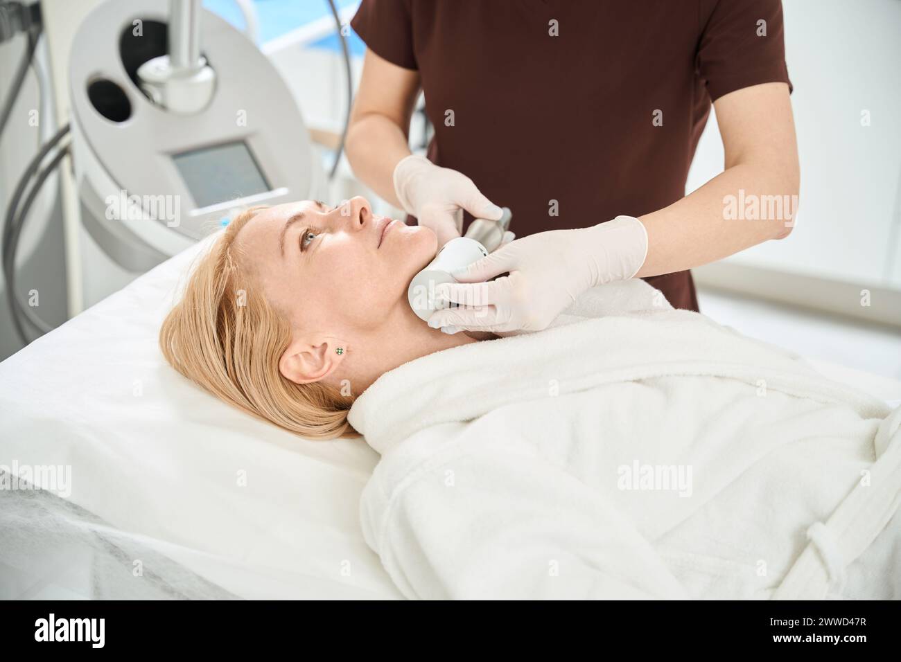 Beautician of medicine clinic applying endosphere therapy on female ...