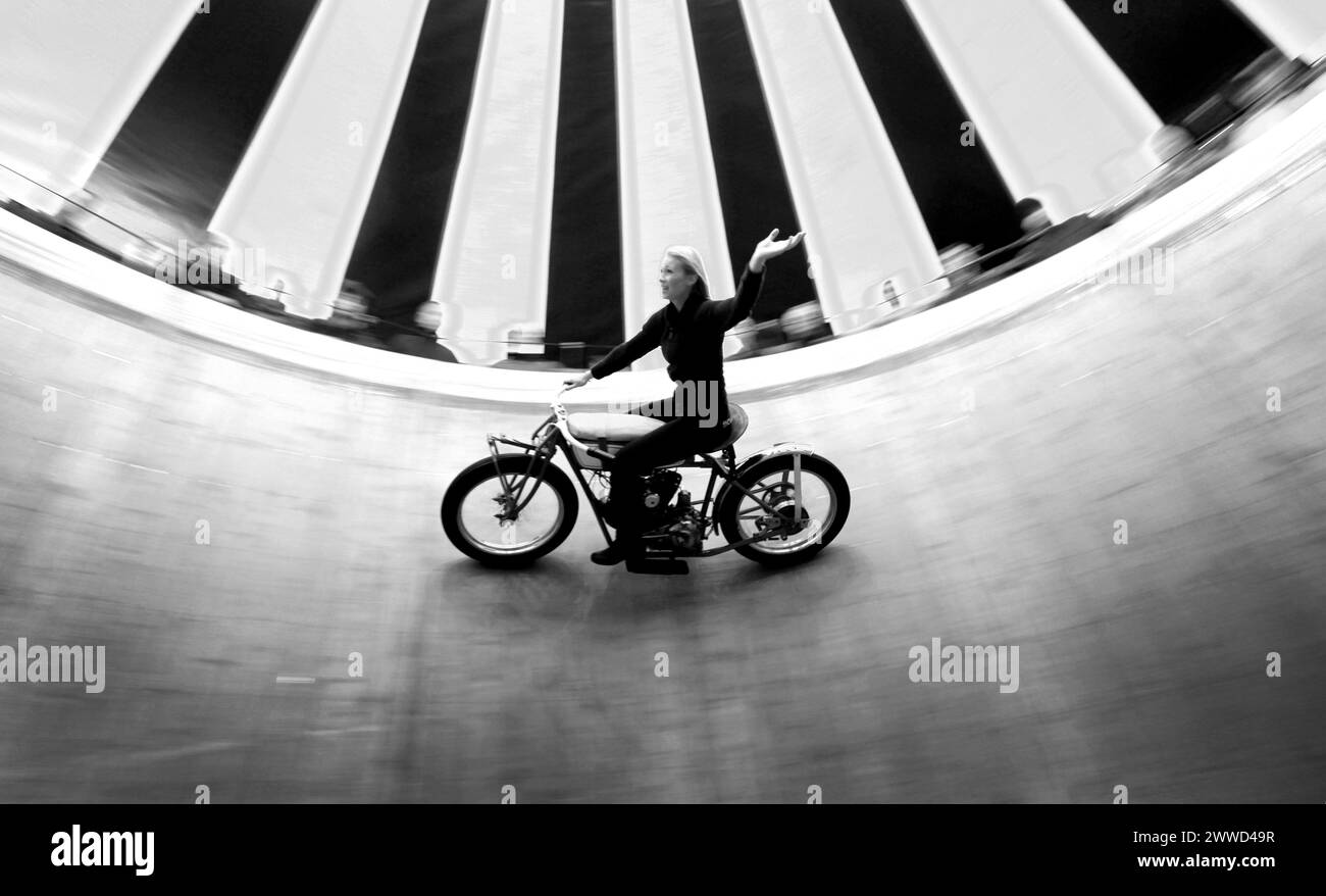 29/04/2012. ..Kerri Cameron, rides the Wall of Death at The Carole Nash ...