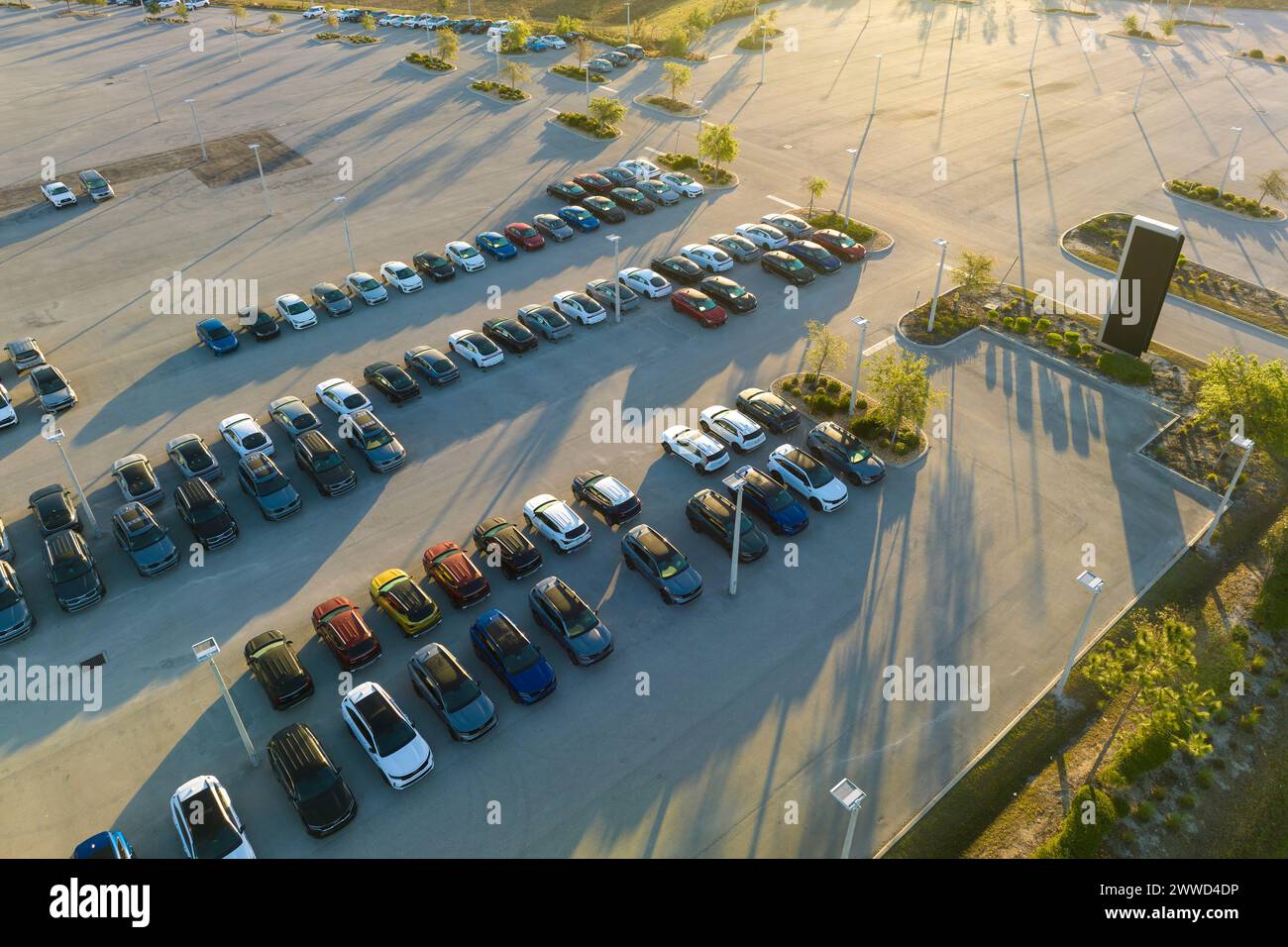 Large parking lot of local dealer with many brand new cars parked for ...