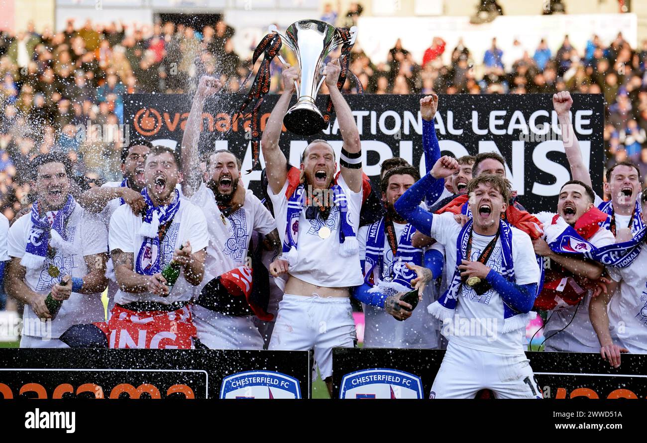 Chesterfield’s Jamie Grimes (with trophy) celebrates their promotion ...