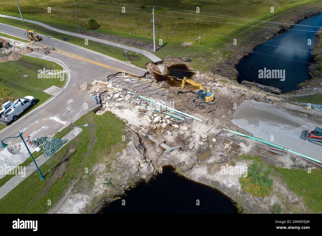 Repair of destroyed bridge after hurricane flood in Florida. Reconstruction of damaged road ...