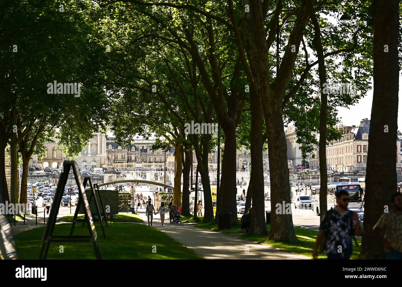Versailles, Paris, France, June 30, 2022. People in the shade of the ...