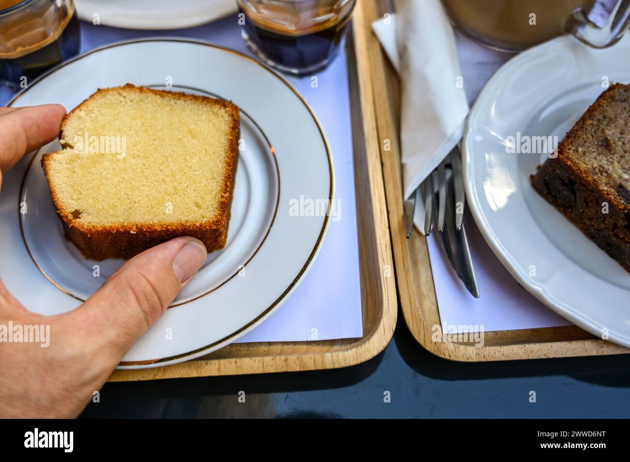 Paris, France. A rich breakfast with typical desserts and cappuccino ...