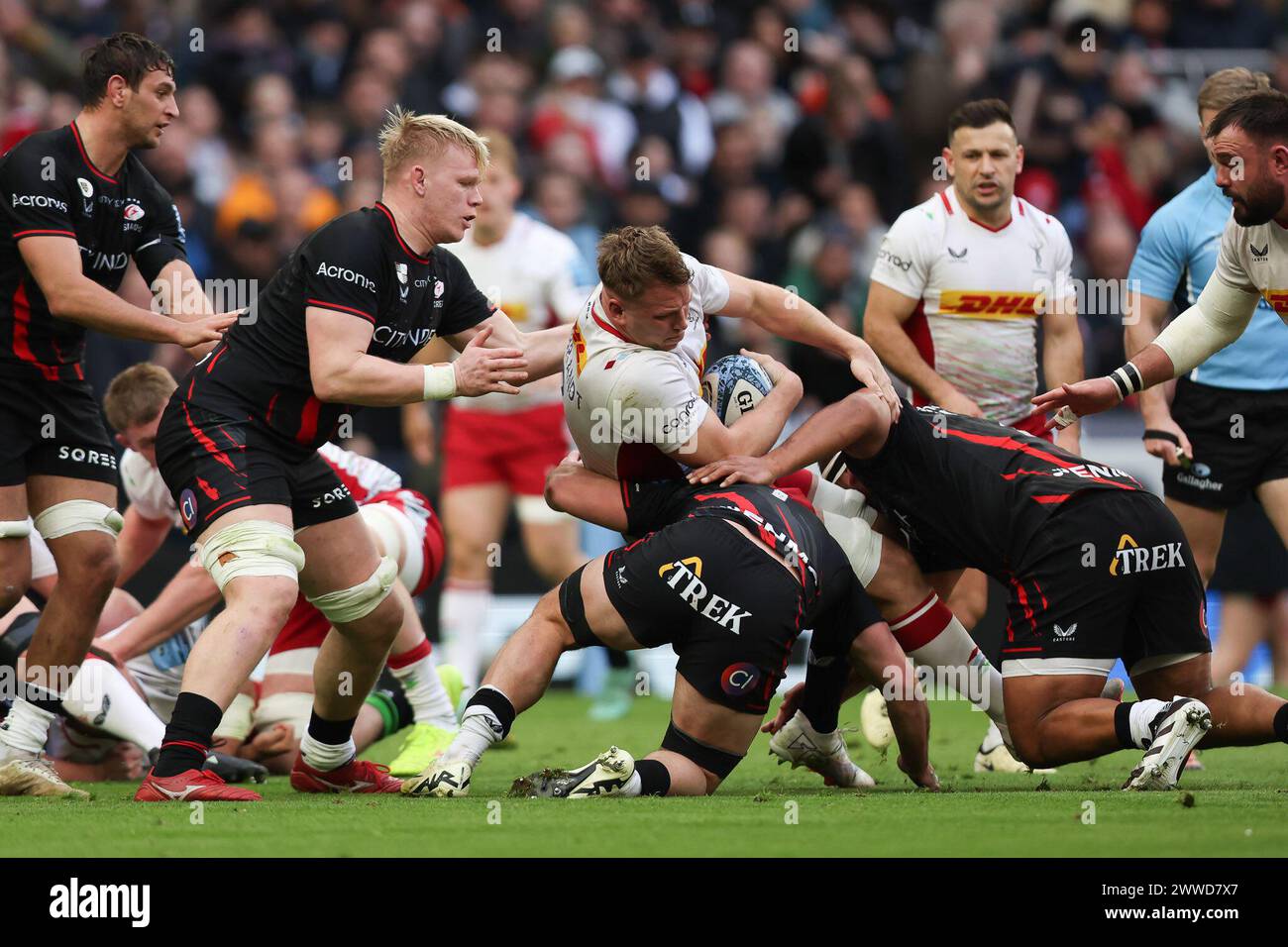 Alex Dombrandt of Harlequins is gang tackled during the Gallagher ...