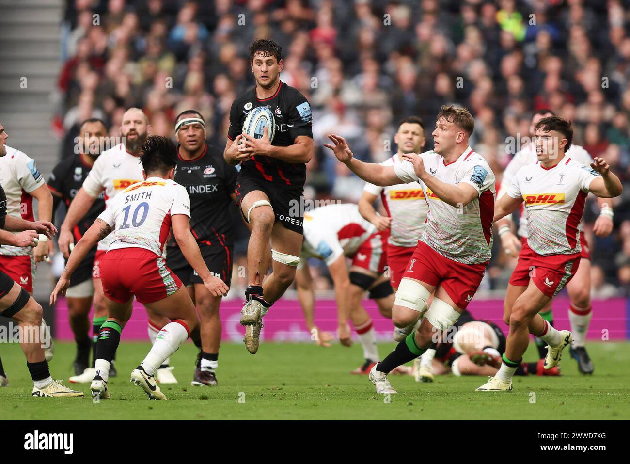 London, UK. 23rd Mar, 2024. Lucio Cinti of Saracens catches a loose ...