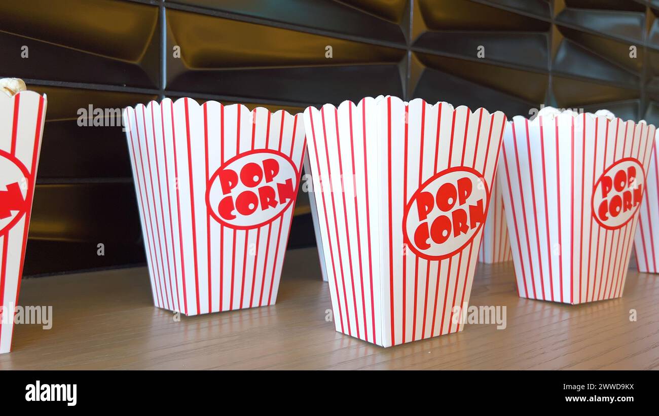 Classic Striped Popcorn Boxes Lined Up for Movie Night Stock Photo - Alamy