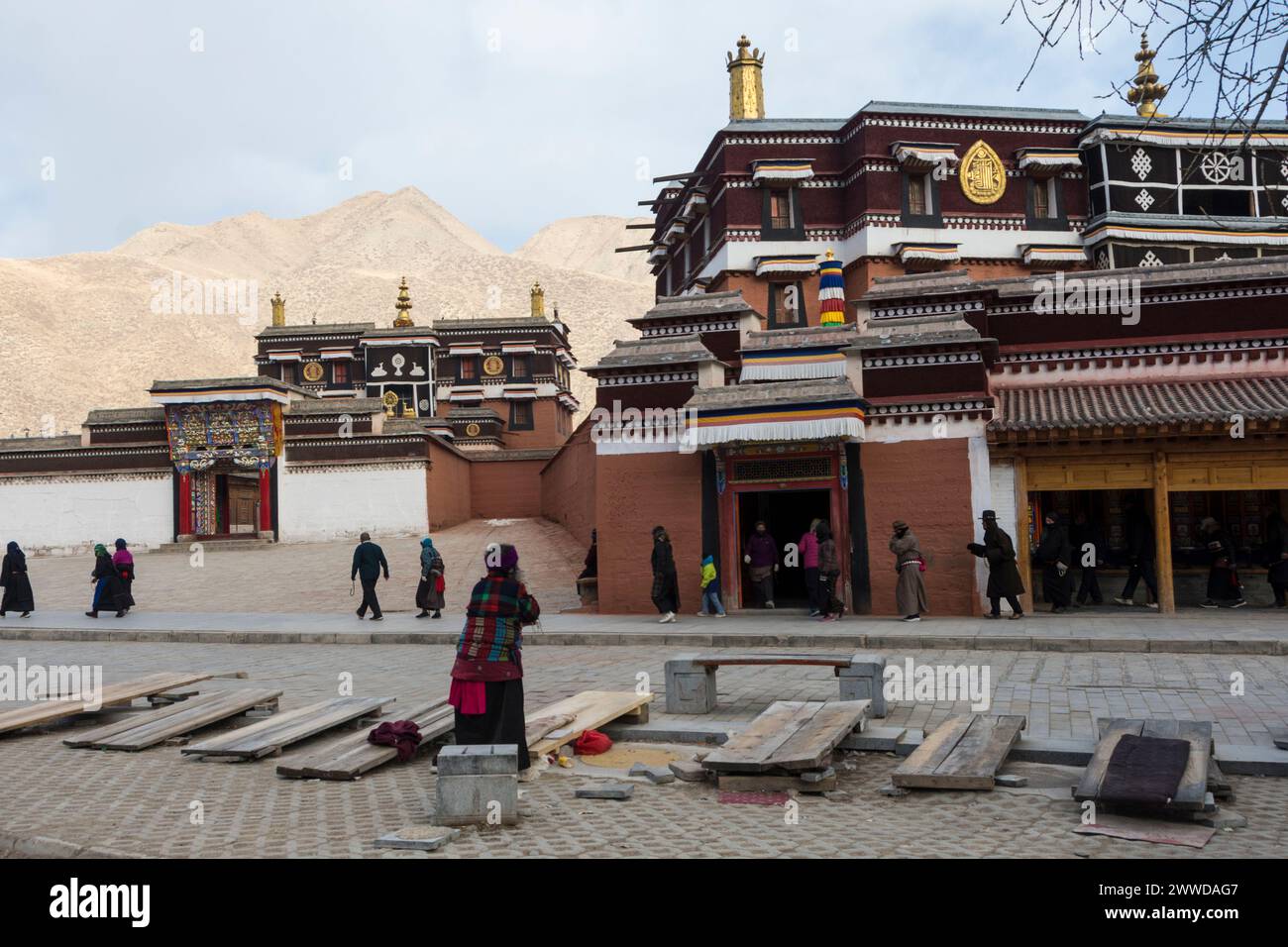 Wooden boards for prostrating in front of one of the temples in Labrang ...