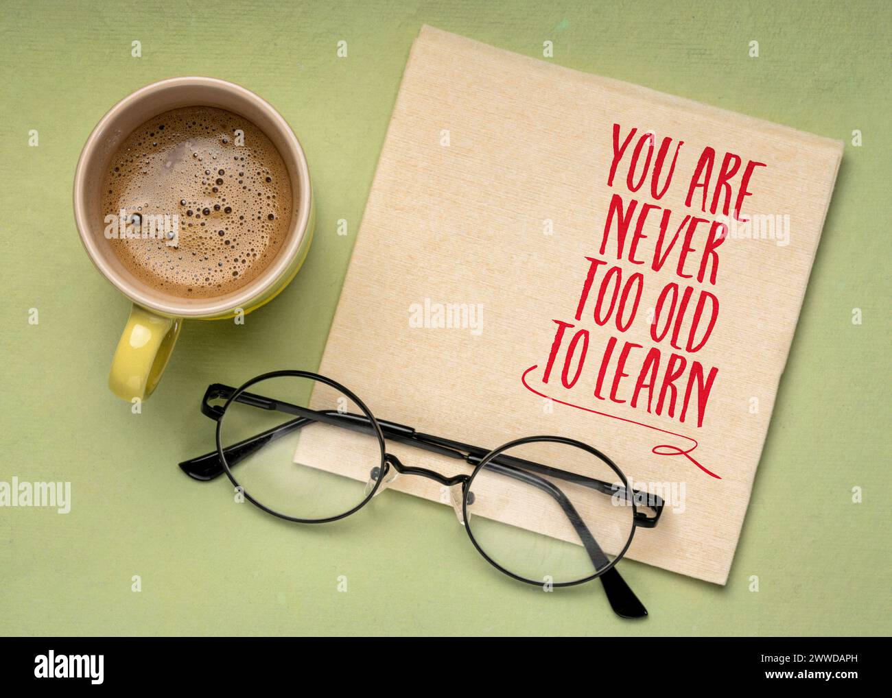You are never too old too learn - motivational words on a napkin with ...