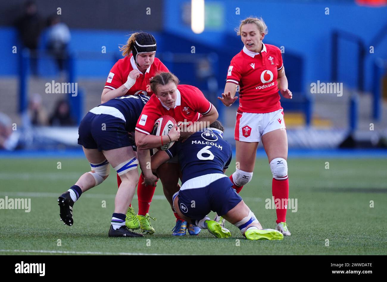 Wales Lleucu George is tackled by Scotlands Rachel Malcolm during the ...