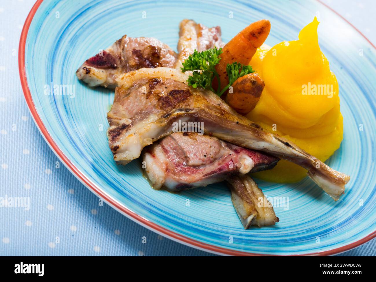 Steamed lamb with mashed rutabaga and carrots Stock Photo - Alamy