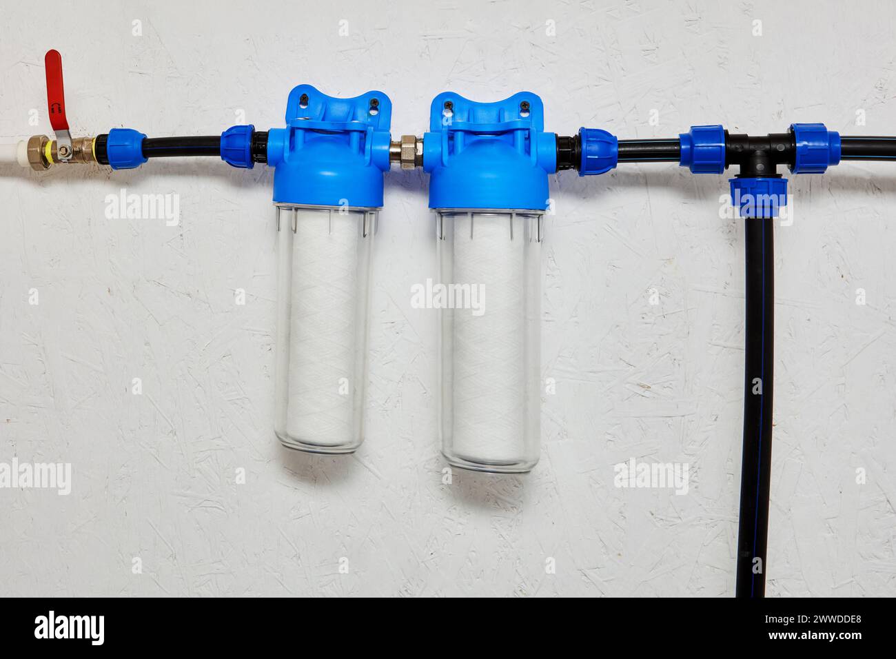 Residential water cleaning system using string wound polypropylene ...