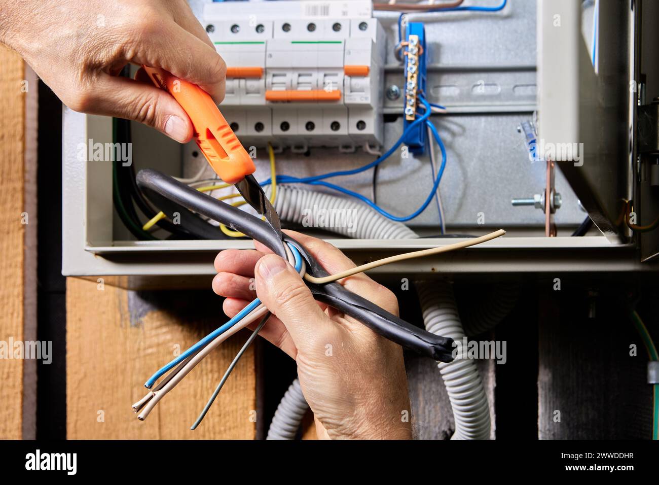 Connection of high-voltage cable to electrical board, removal of over ...