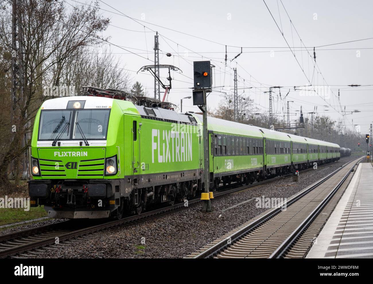 Trebbin, Germany. 22nd Mar, 2024. A Flixtrain passes Trebbin station ...