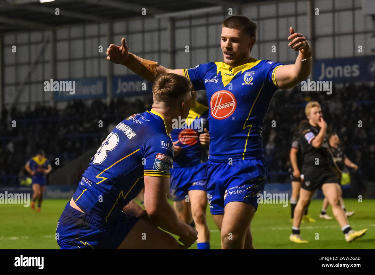 Matty Nicholson of Warrington Wolves celebrates his try during the ...