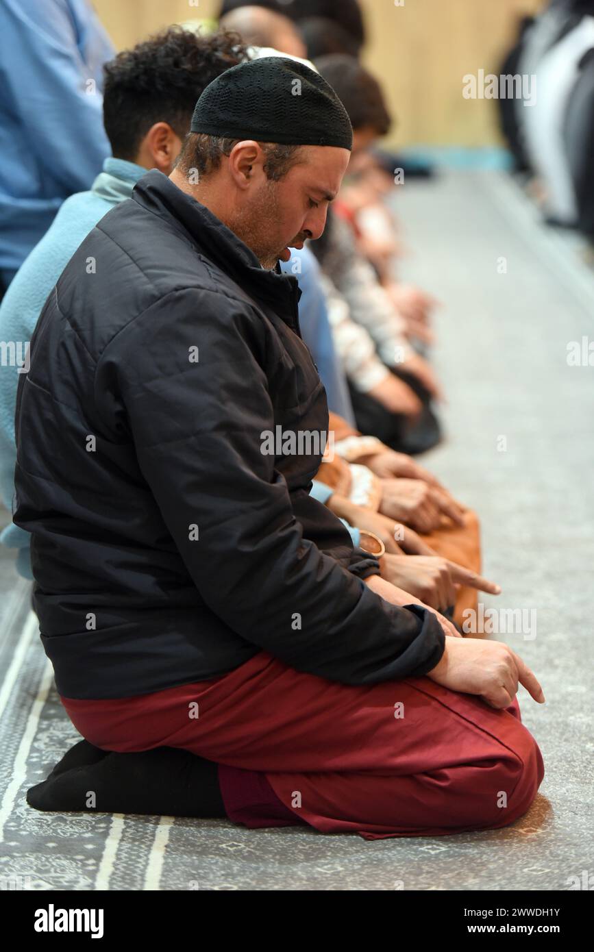 Muslim men pray in the kneeling position (Ruku) during the fifth prayer ...