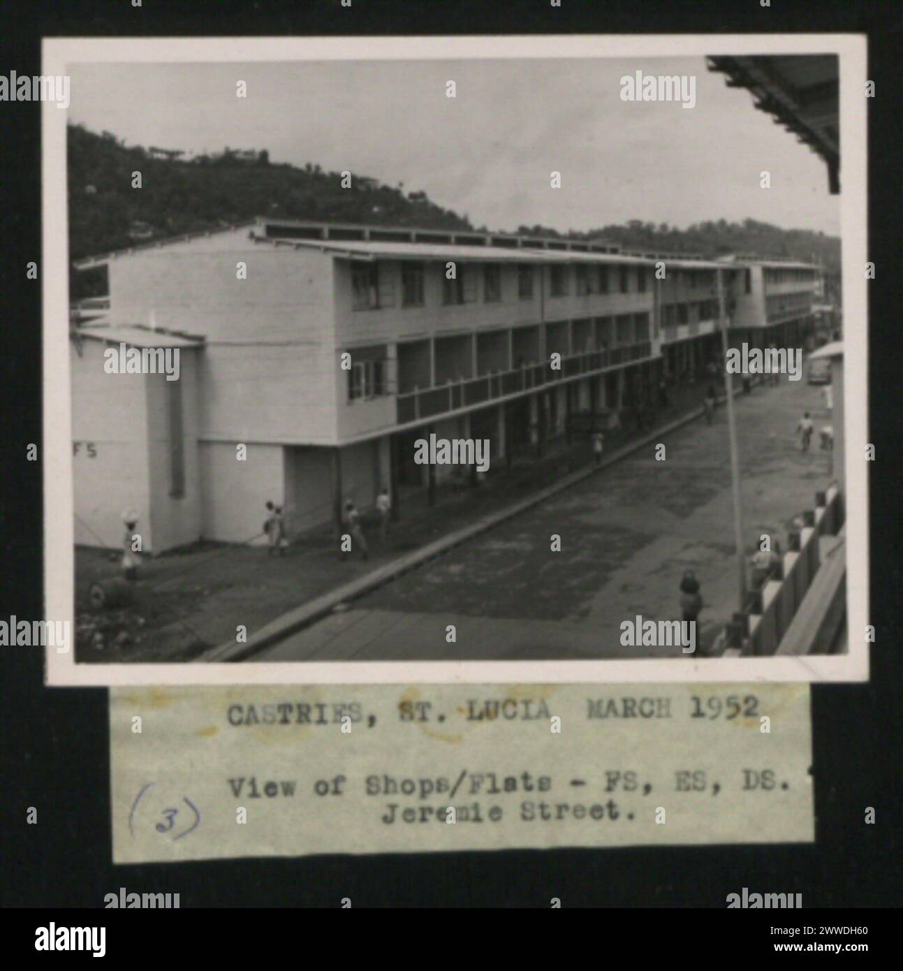 Photograph shows a view of shops and flats labeled FS, ES, and DS along ...