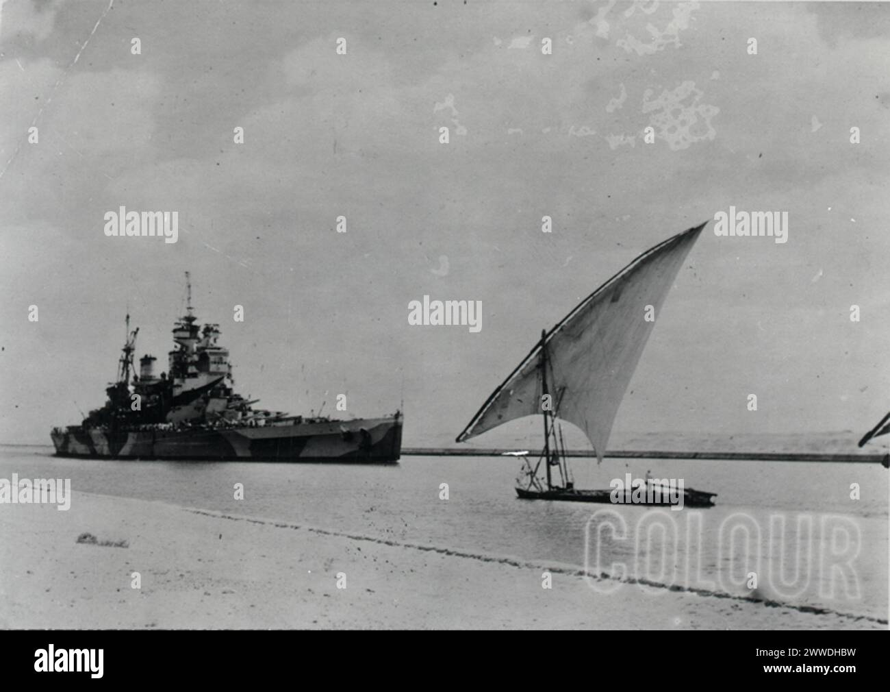 A Meeting at Suez Description: "The British battleship Howe, 35,000 ton ...