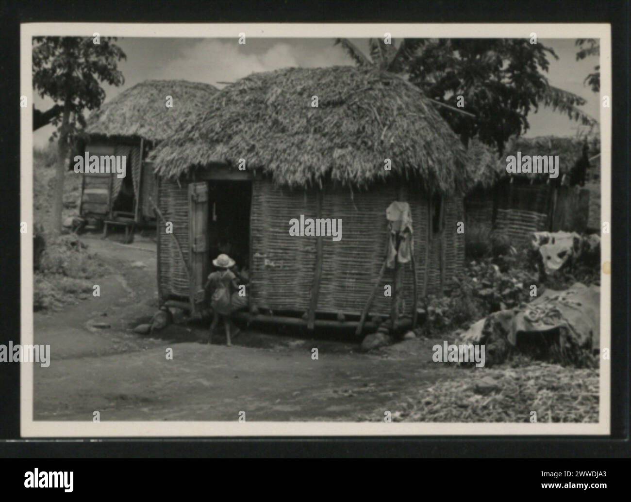 Description: Hut at "Basin Hole" village. Location: Basin Hole, St ...