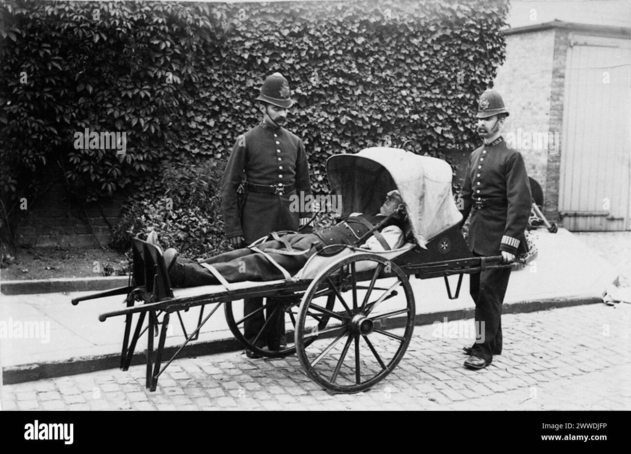 Met with St. John Ambulance Description: "Photograph of two policemen ...