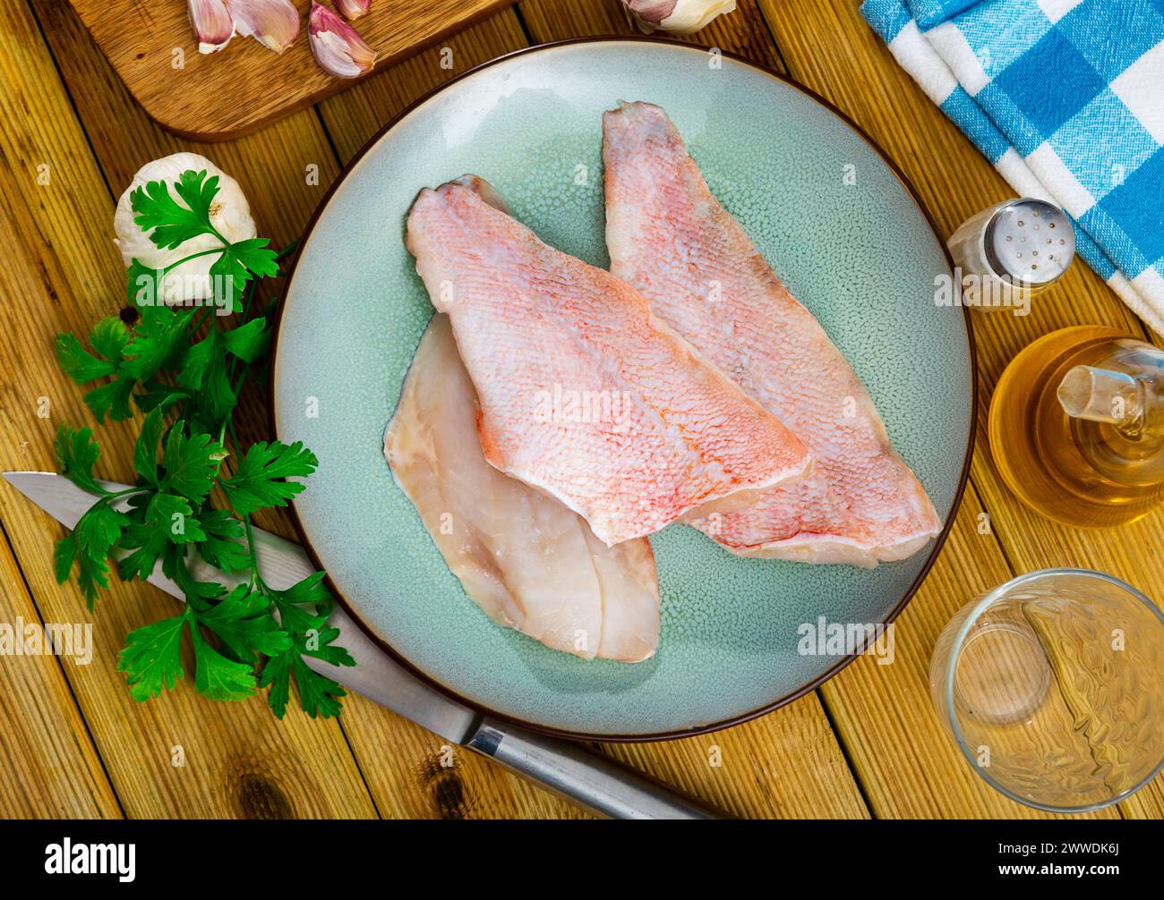 Fresh raw fillet of sea bass Stock Photo - Alamy