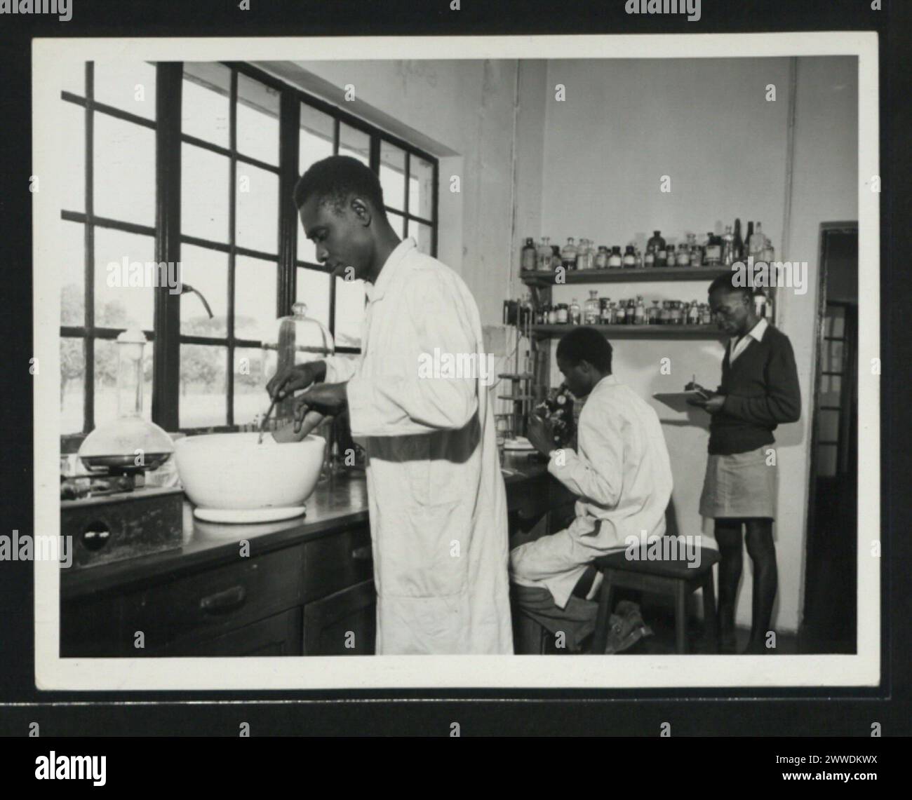Description: One of the laboratories at Abuko. In the foreground Mr. G ...