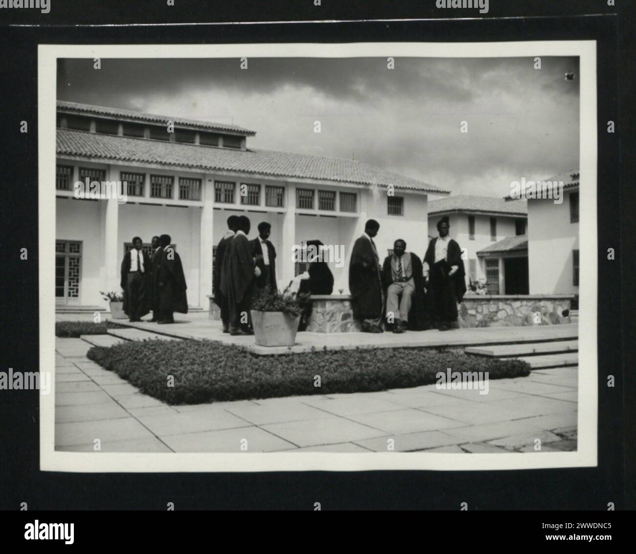 Description: Students with a senior tutor outside Legon Hall, one of ...