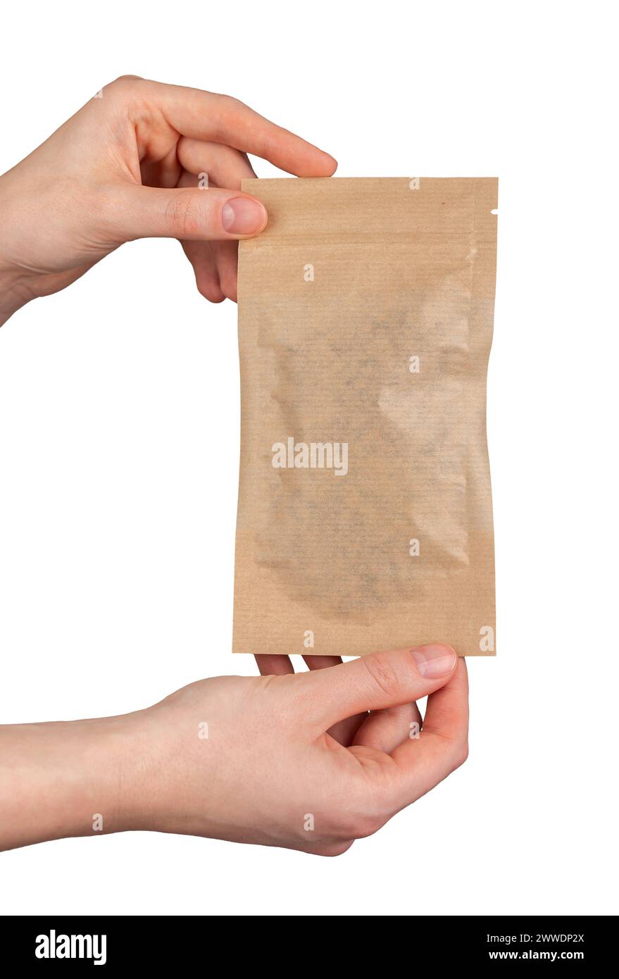Hand holding small zip-lock kraft paper bag. Ziplock pouch, eco brown ...