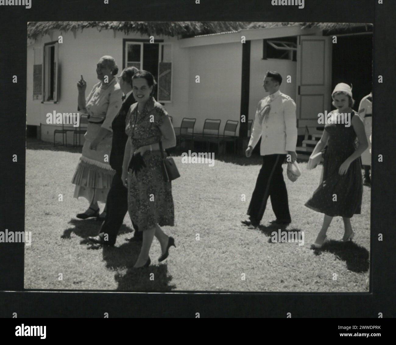 Description: Queen Salote, Sir Ronald Garvey and Lady G arvey stroll in ...