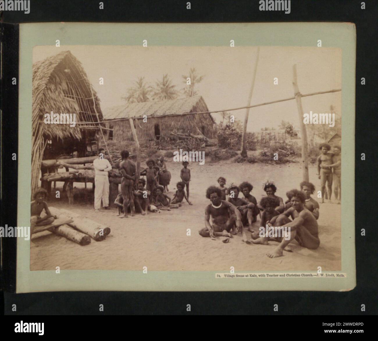 Description: Village scene at Kalo, with teacher and Christian church ...