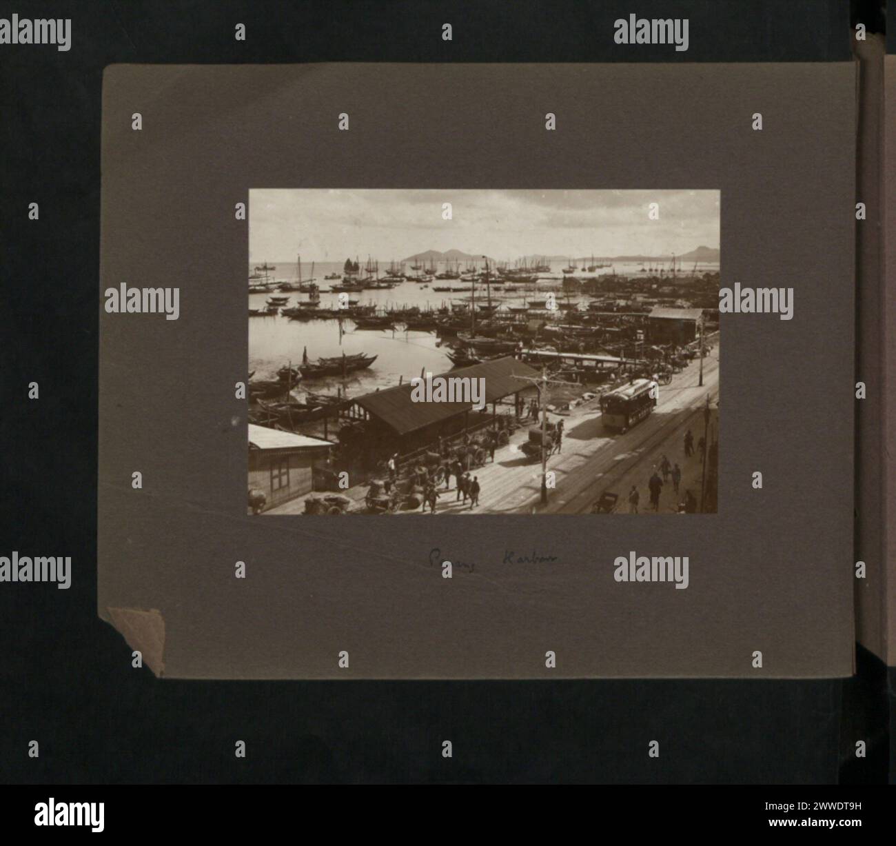 Images from the 1930s–1940s depict Penang Harbour in Malaya, showing ...