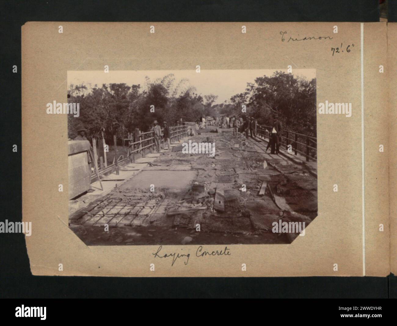 Photograph showing concrete being laid on the Trianon Bridge in Trianon ...