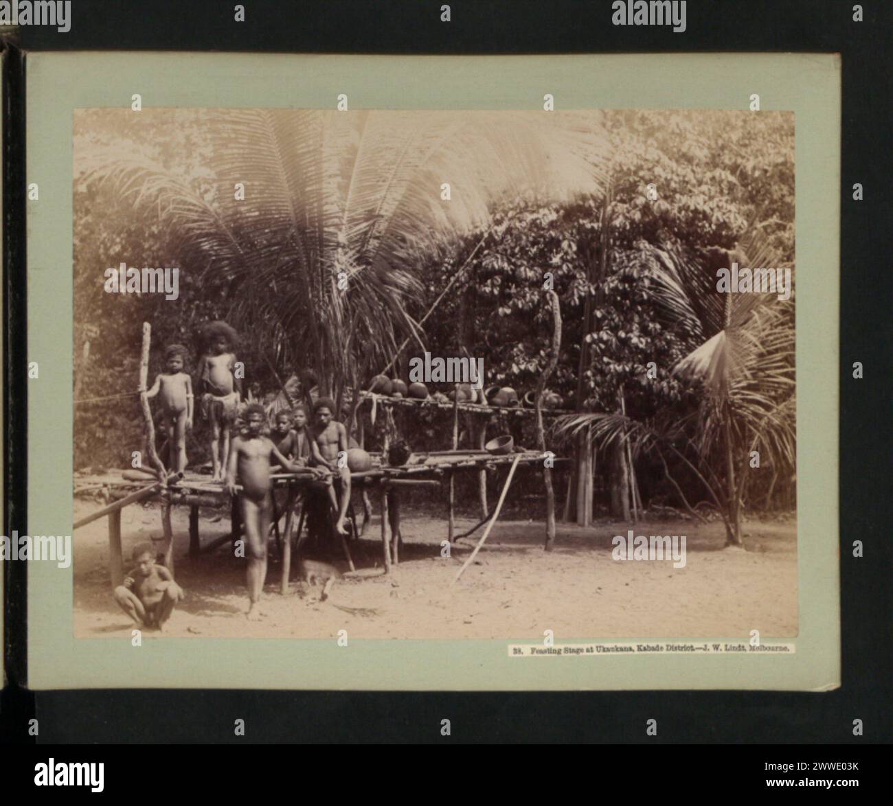 Description: Fe??sting stage at Ukau?kana, Kabade District.-J.W. Lindt ...