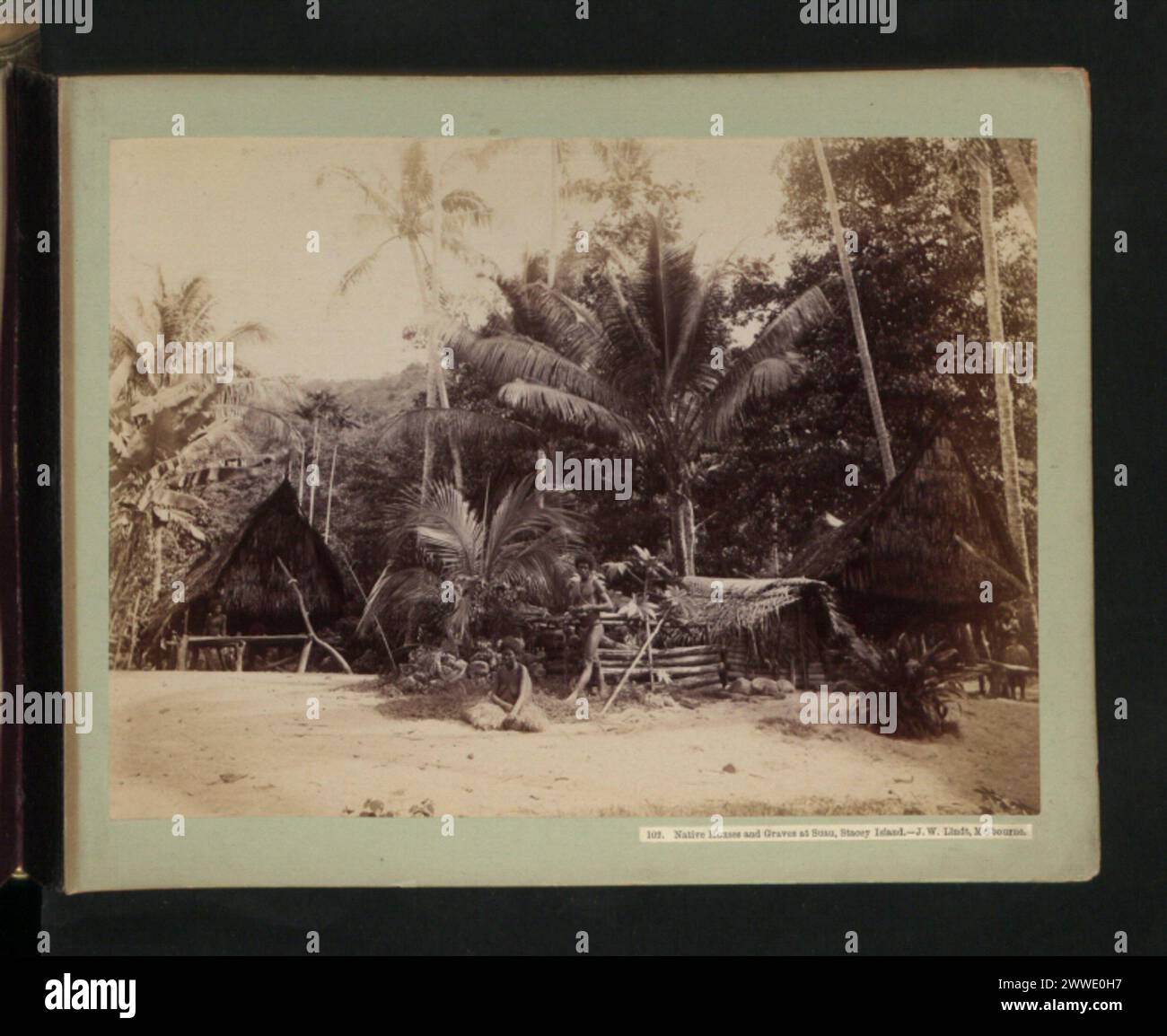 Description: Native houses and graves at Susu, Stacey Island.-J.W ...