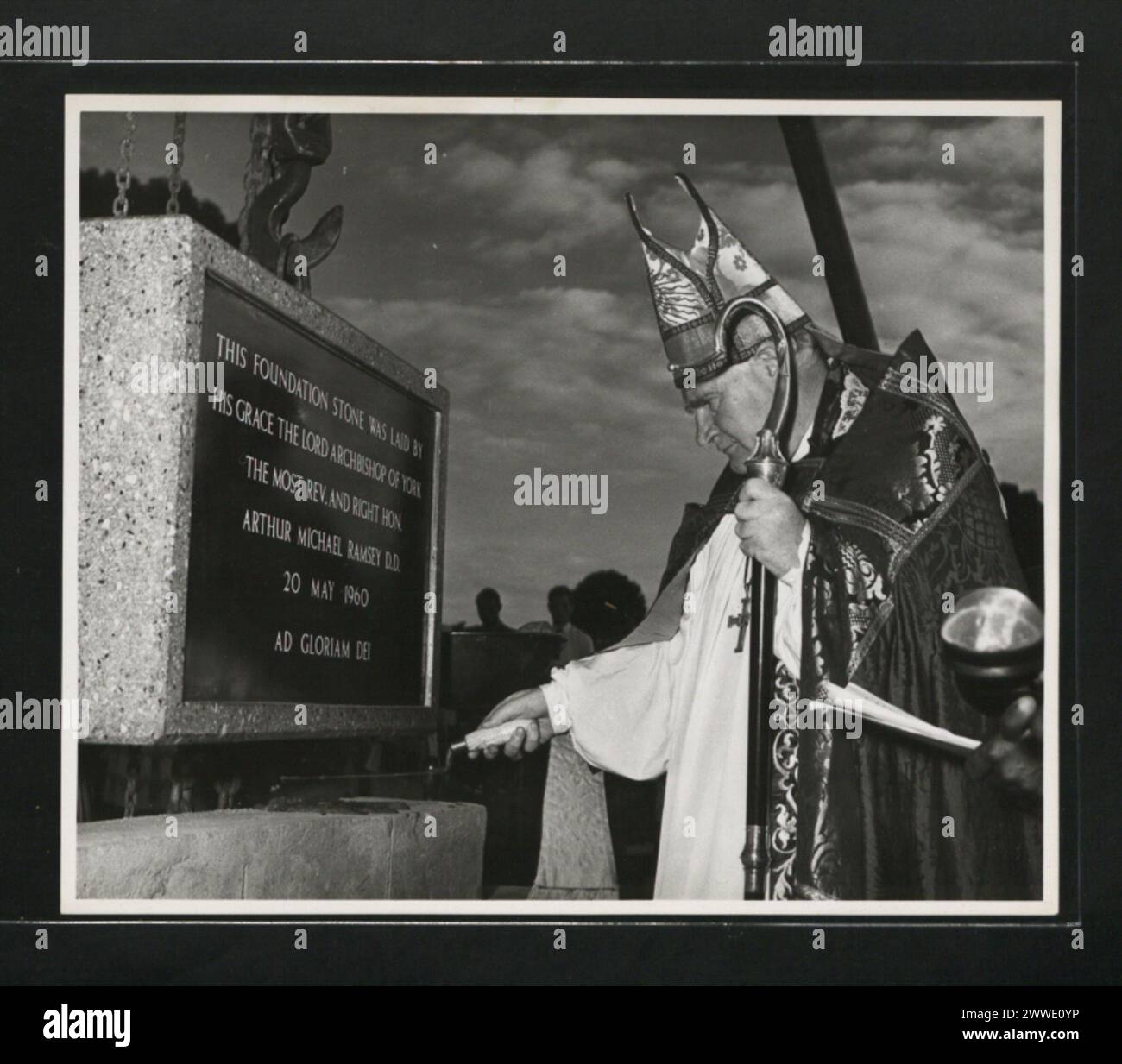 Description: The Archbishop of York, Dr. Michael Ramsey, lays the ...