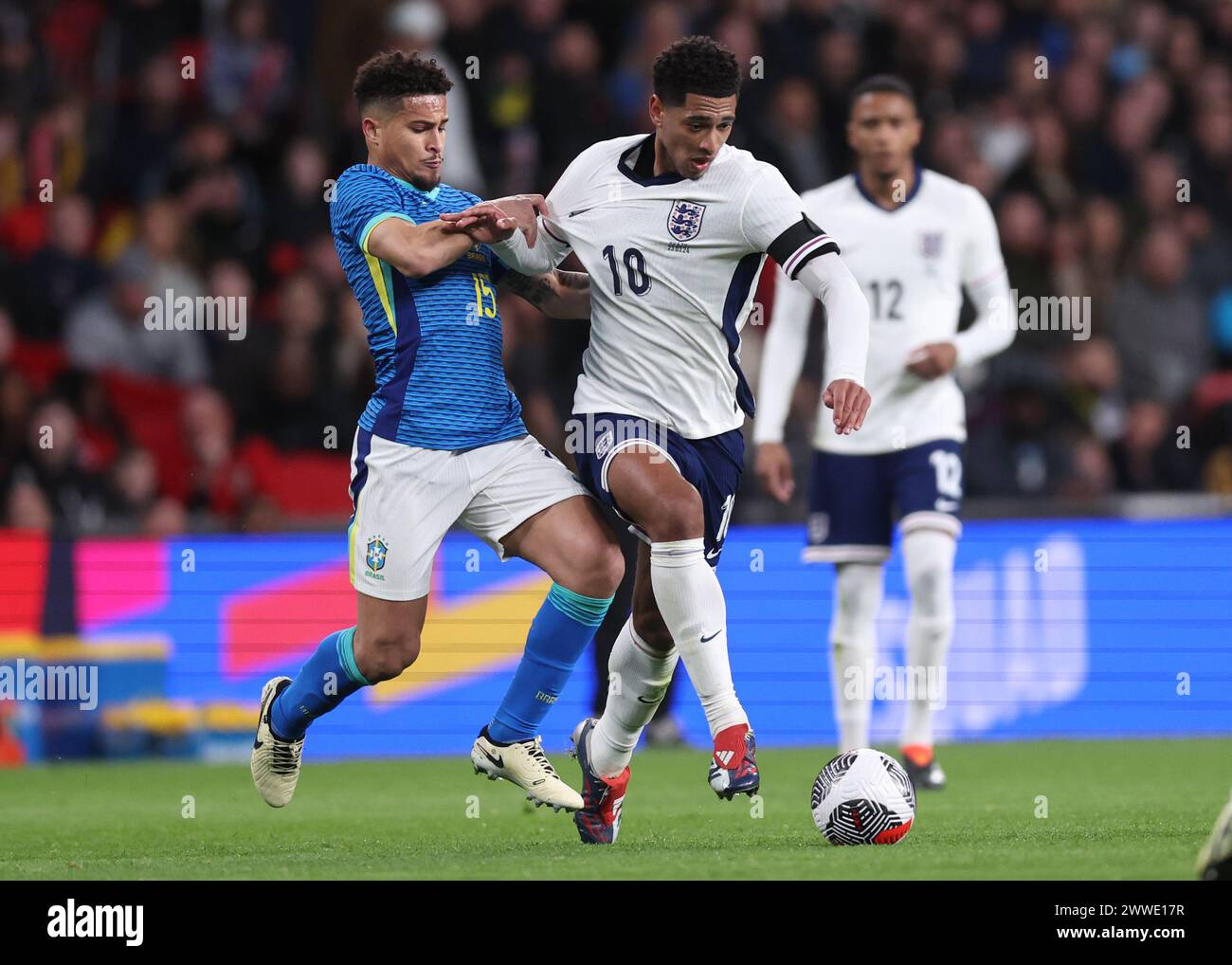 London, UK. 23rd Mar, 2024. Joao Gomes of Brazil tussles with Jude ...