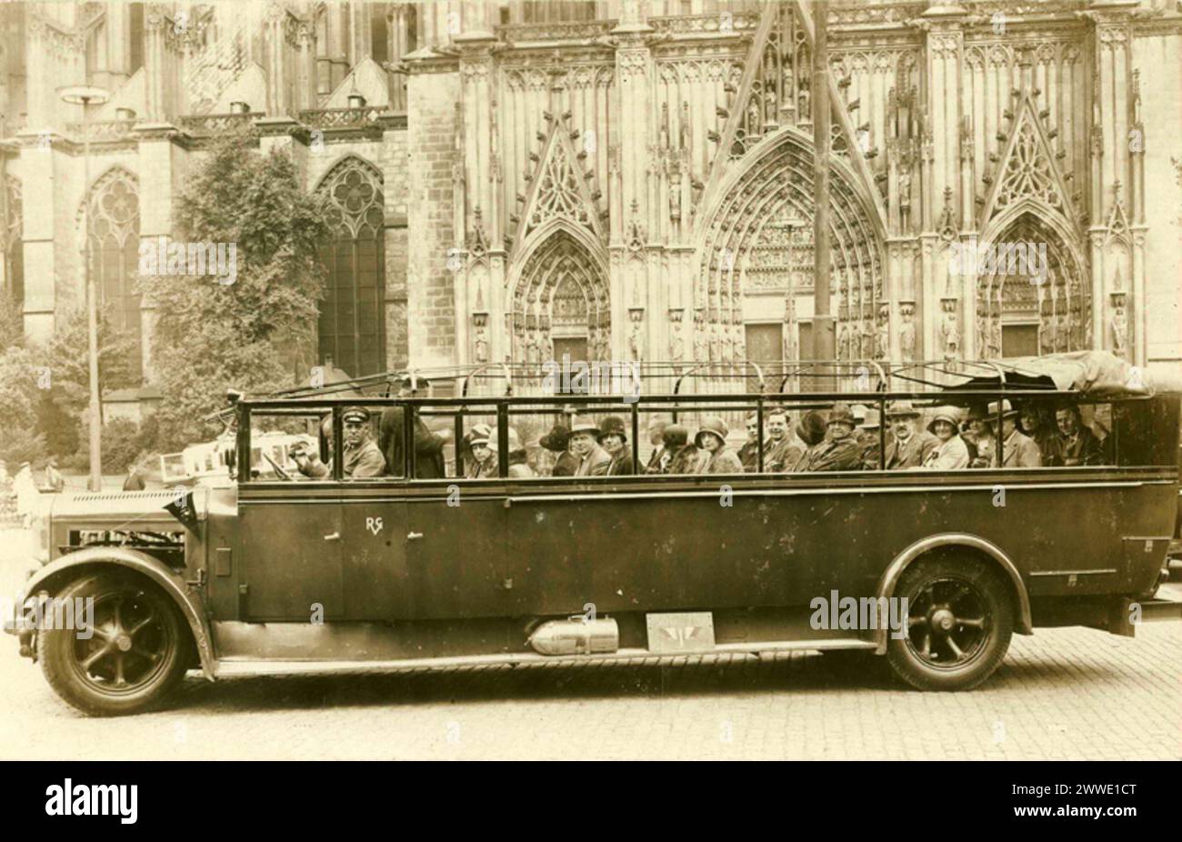 Sightseeing Description: Open top tourist bus Date: 1920 sepia ...
