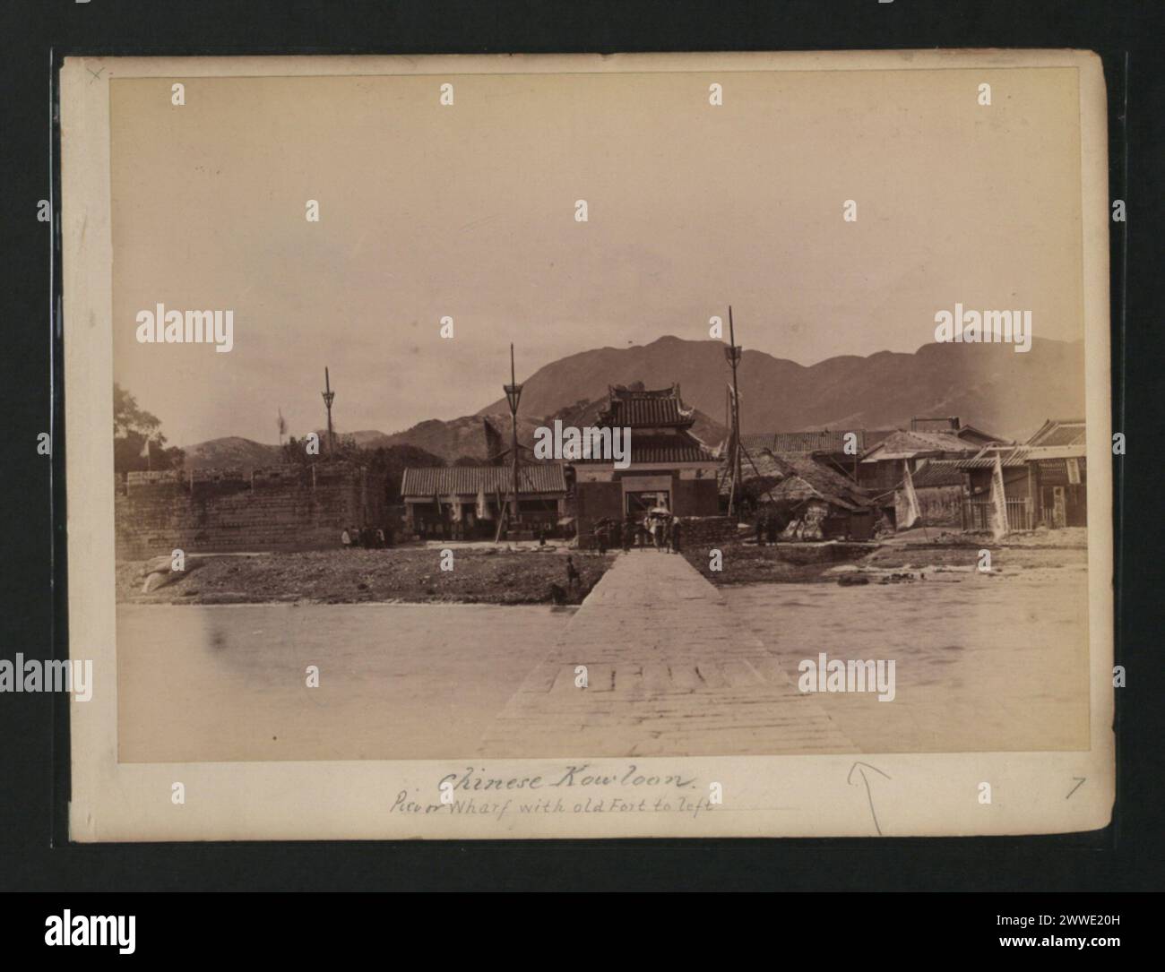 In Chinese Kowloon, Hong Kong, in 1898, the pier and wharf area ...