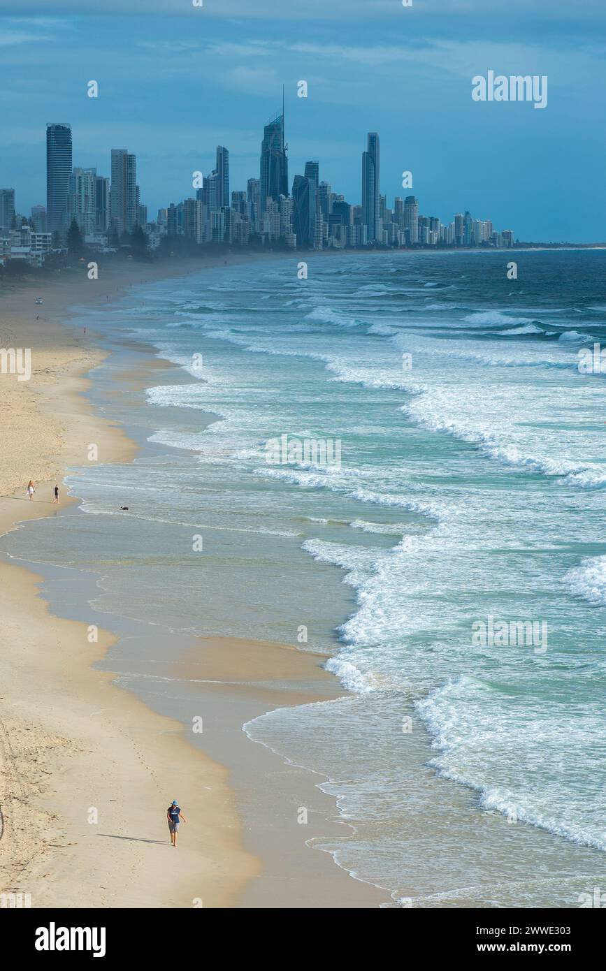 Gold Coast Skyline With People Walking On Beach, Gold Coast, Queensland ...