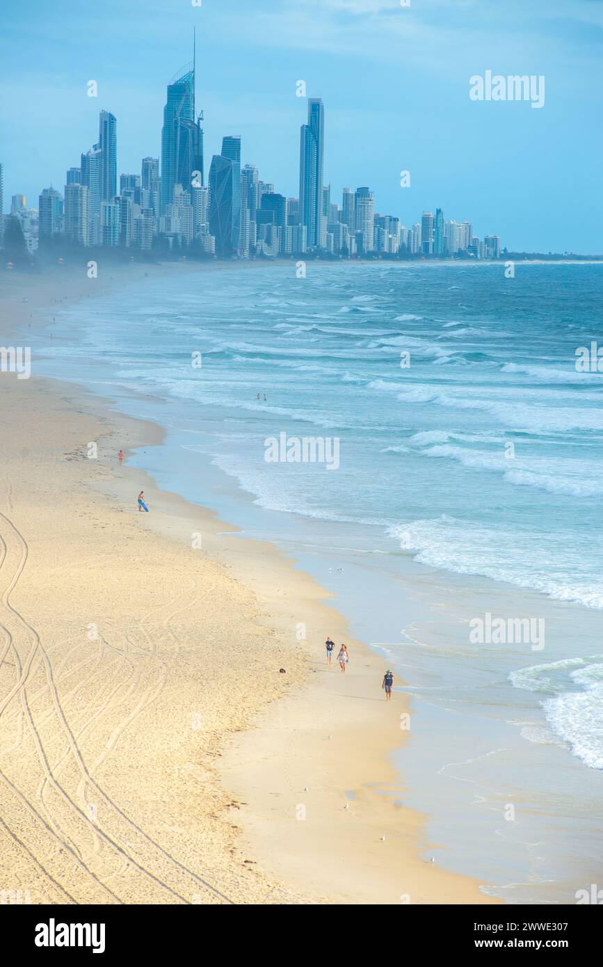 Gold Coast Skyline With People Walking On Beach, Gold Coast, Queensland ...