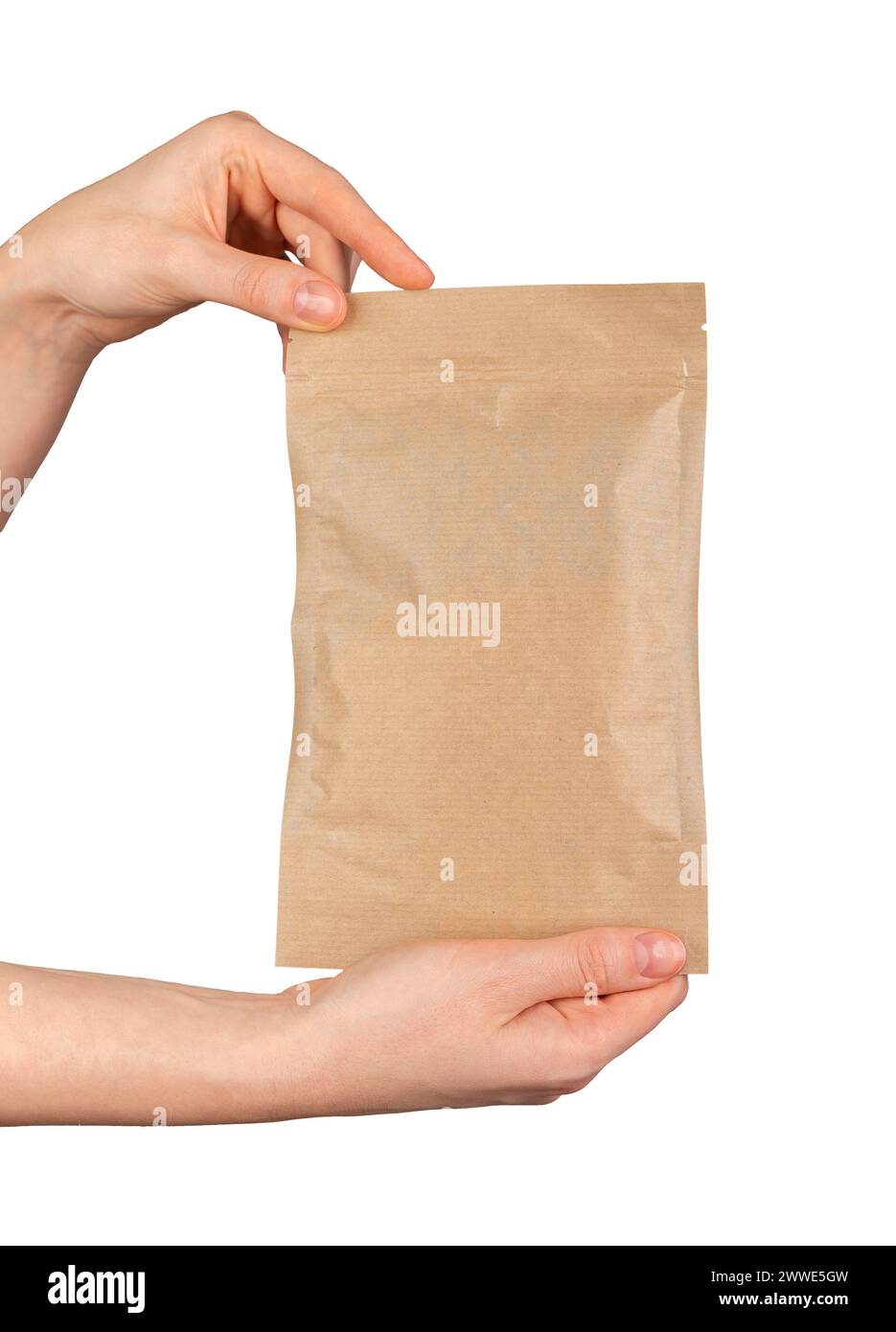Hand holding zip-lock kraft paper bag. Ziplock pouch, craft eco package ...