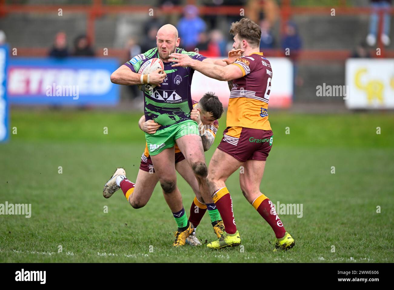 Liam Watts of Castleford Tigers is tackled during the Betfred Challenge Cup Sixth Round match ...